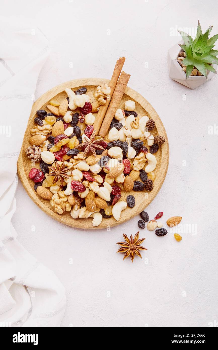 Healthy food and snacks. Aesthetic wooden bowl with assorted nuts ...