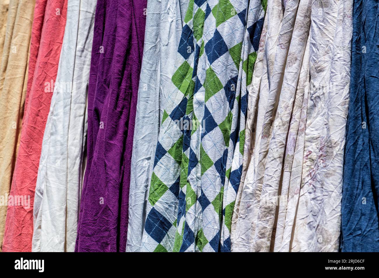 Colours of cloth marketplace – beautiful colored cloths from open ...