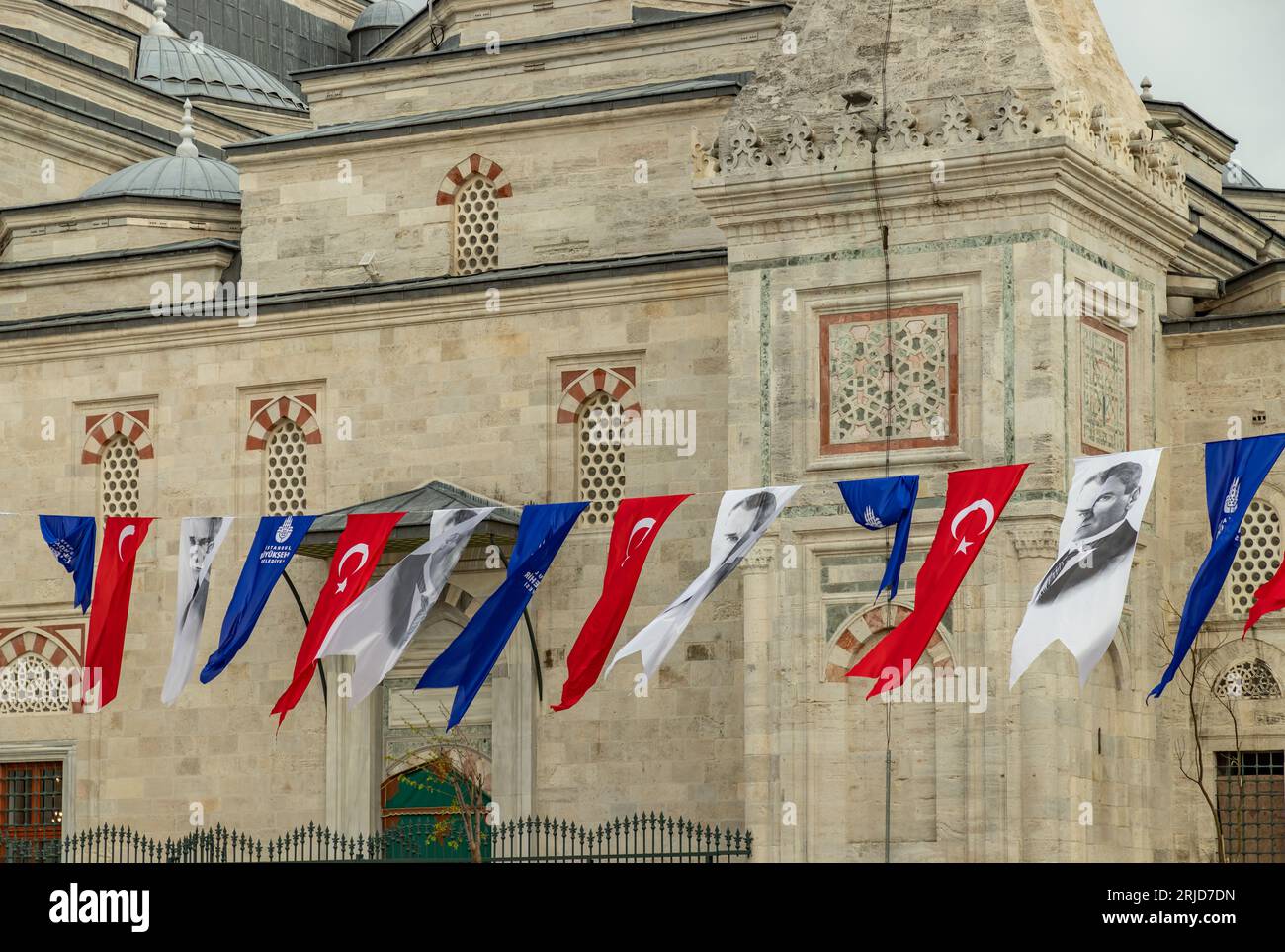 A picture of Istanbul, Turkish and Ataturk banners next to a mosque ...