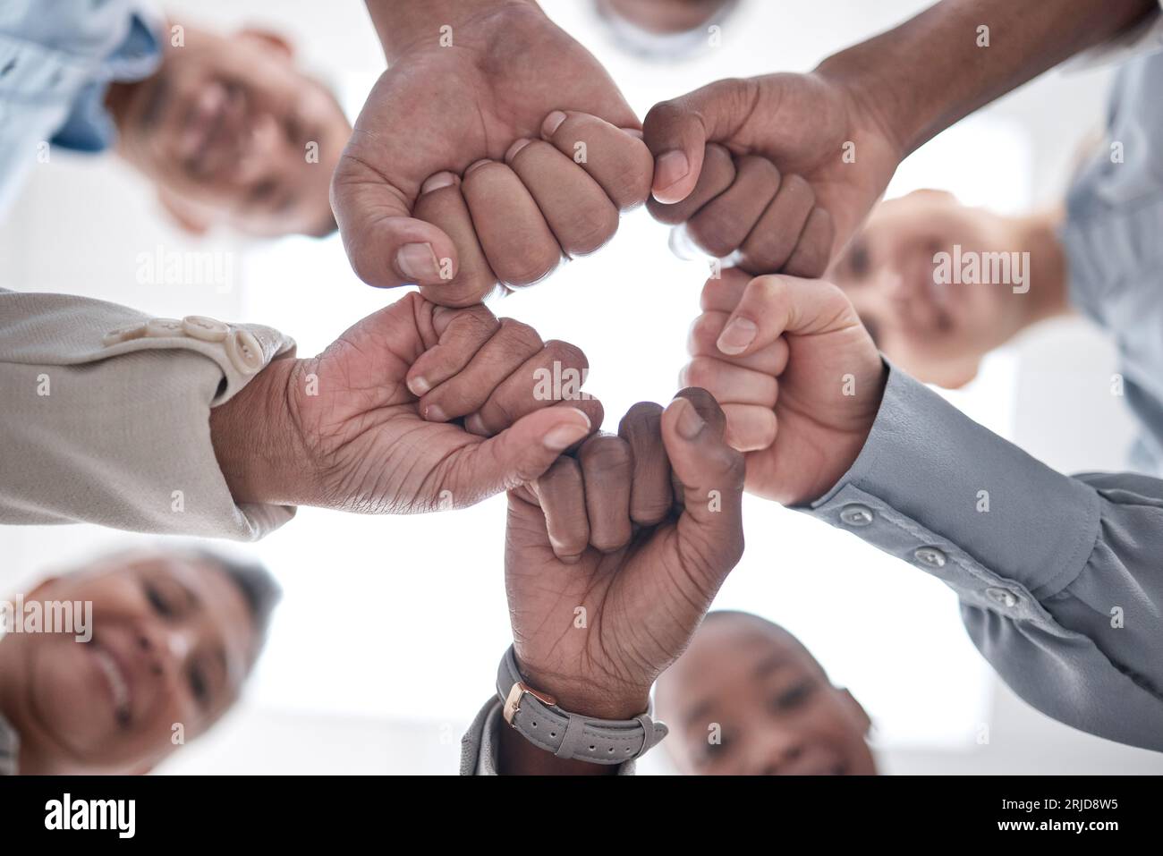 Hands fist bump, group circle and team celebrate community cooperation ...