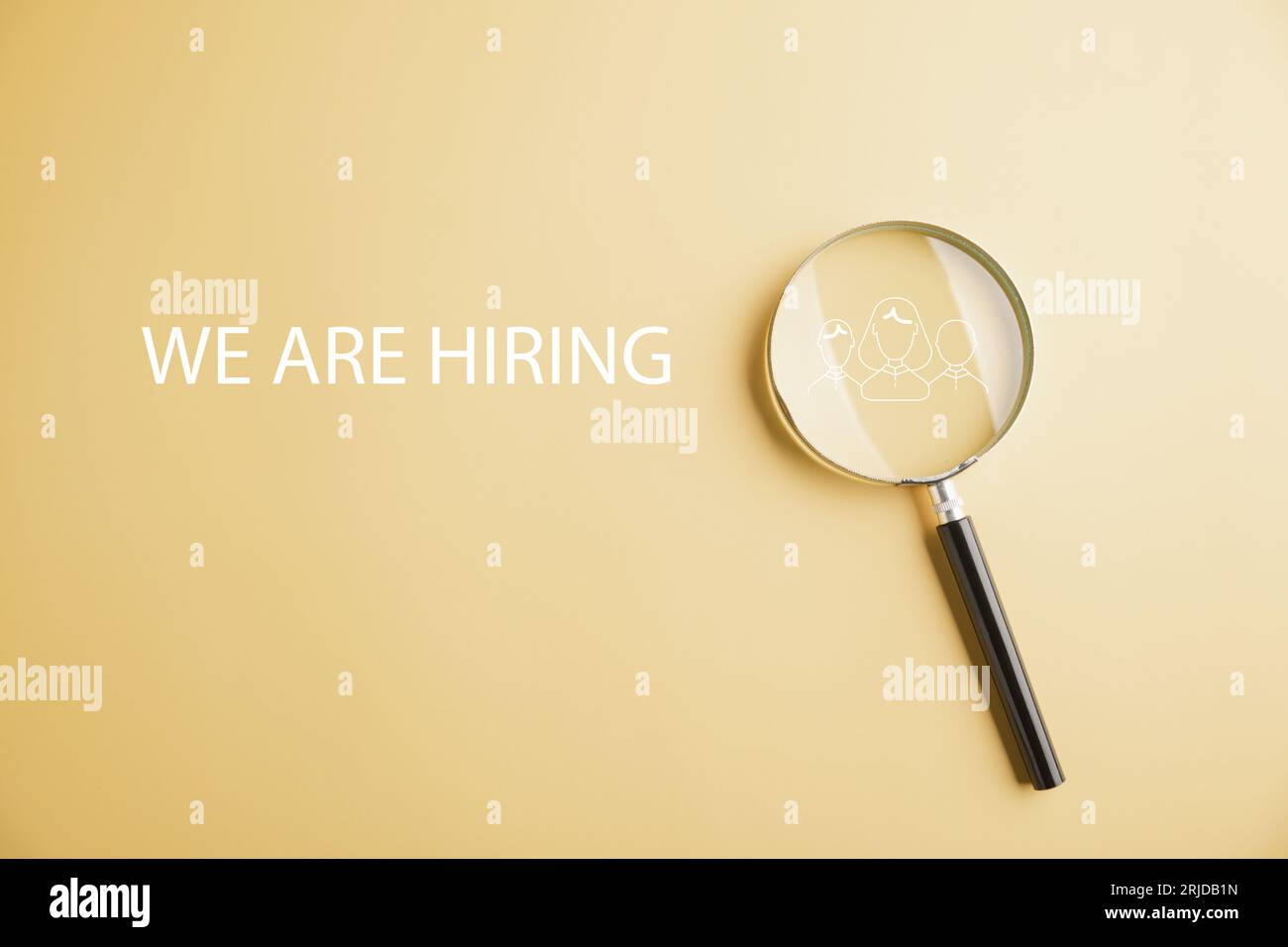 Focused magnifying glass on job search concept Stock Photo - Alamy