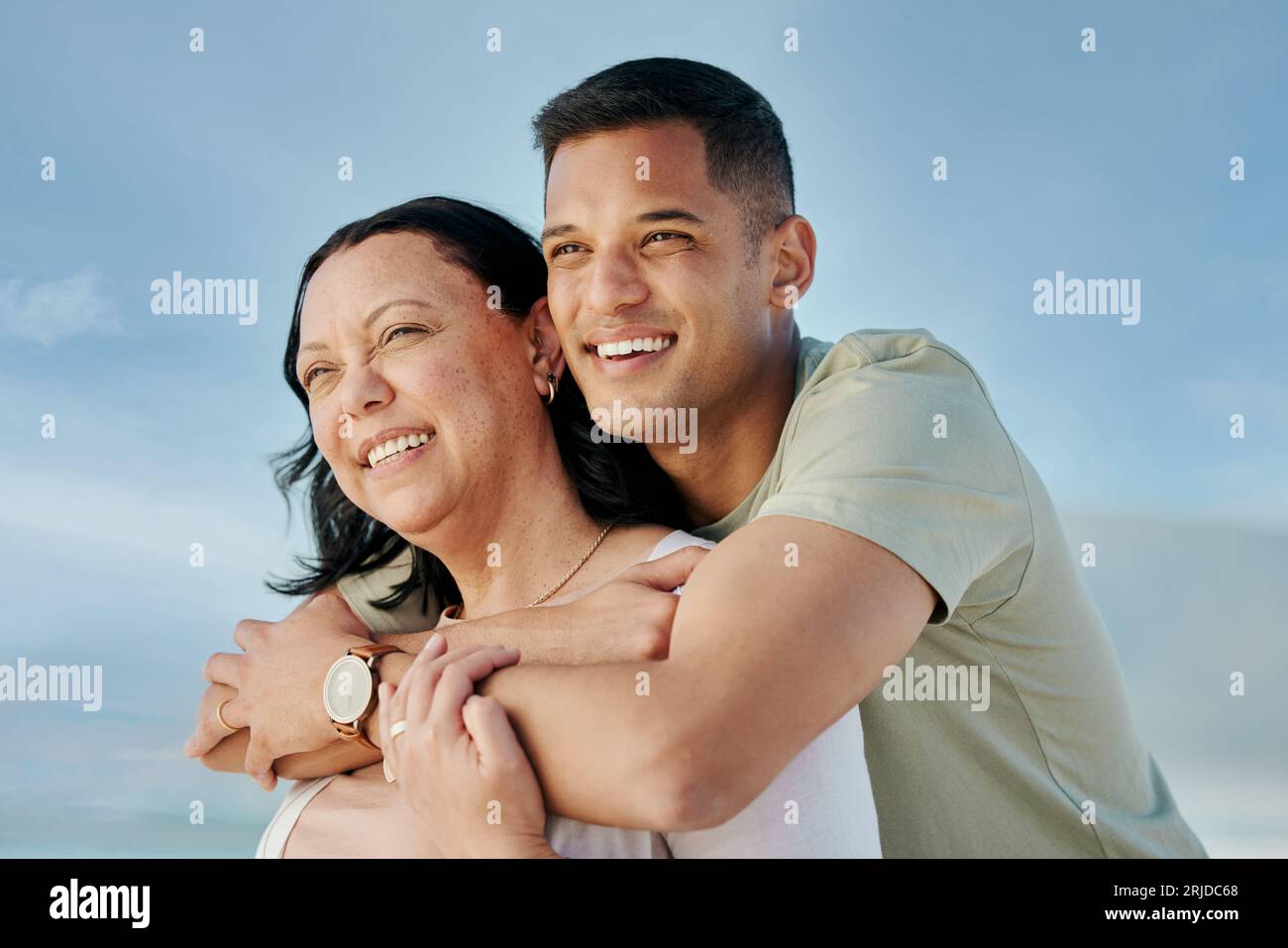 Love, hug and man with senior mother at beach happy, bond and relax in ...
