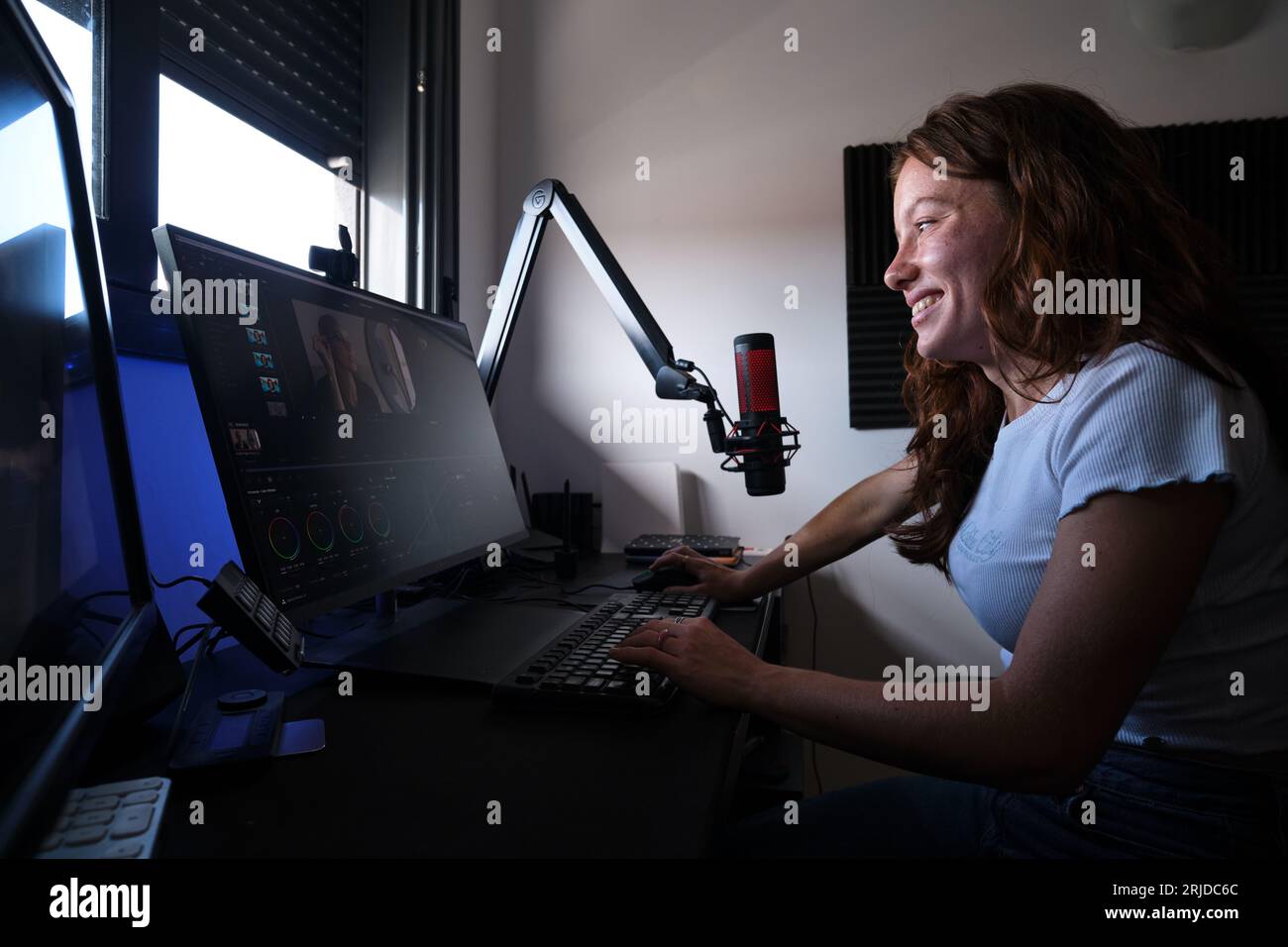 Podcasting microphone laptop woman hi-res stock photography and images ...
