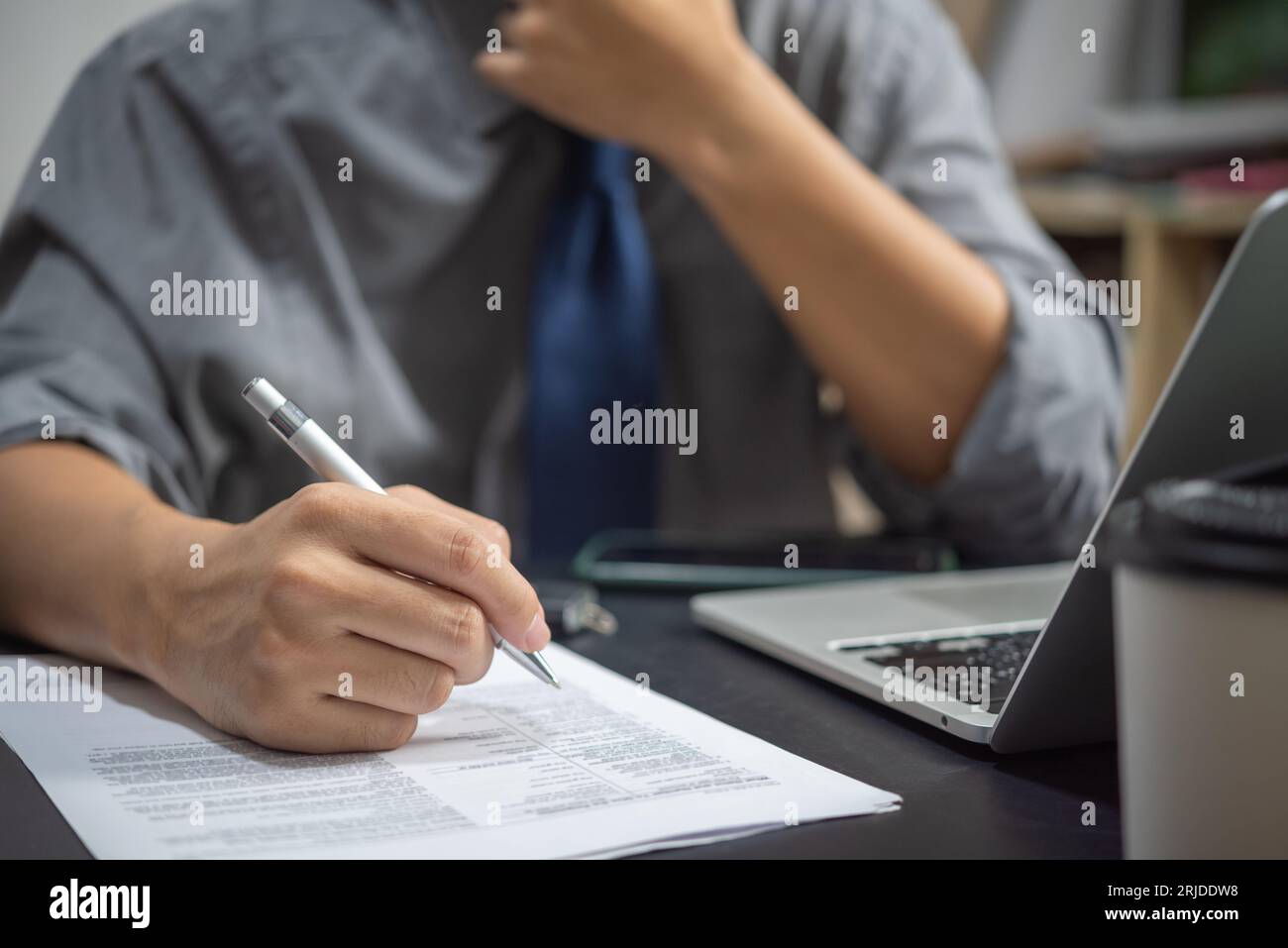 Business person Writing contract law and paper work for business and ...