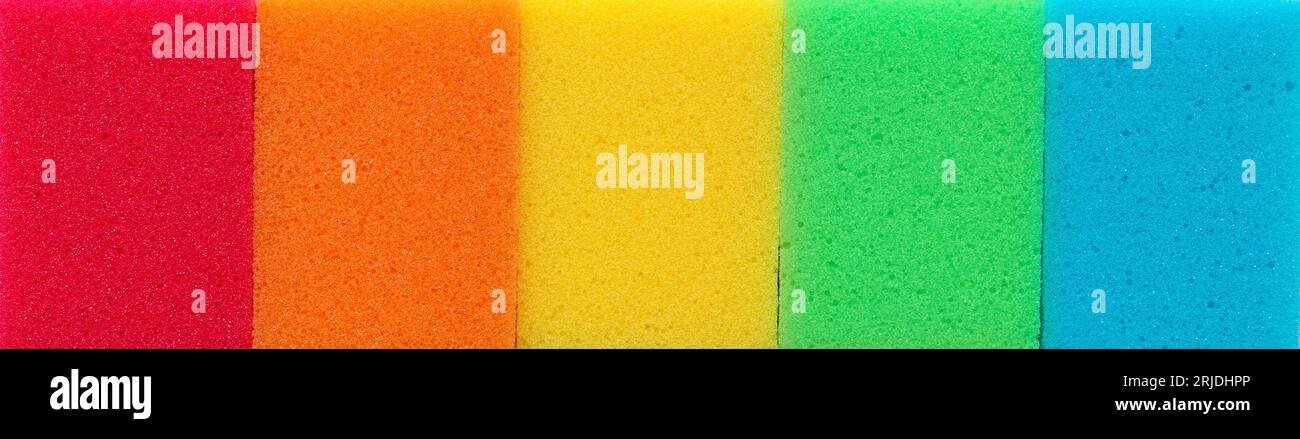Colourful kitchen sponges in a row, textured panorama background Stock ...