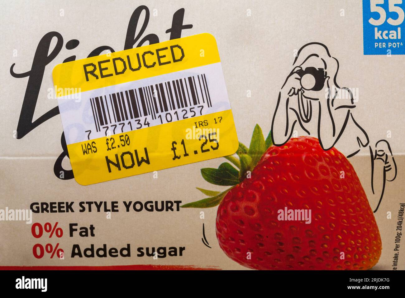 Yellow reduced sticker on multipack of Light & Free Greek style yogurts ...