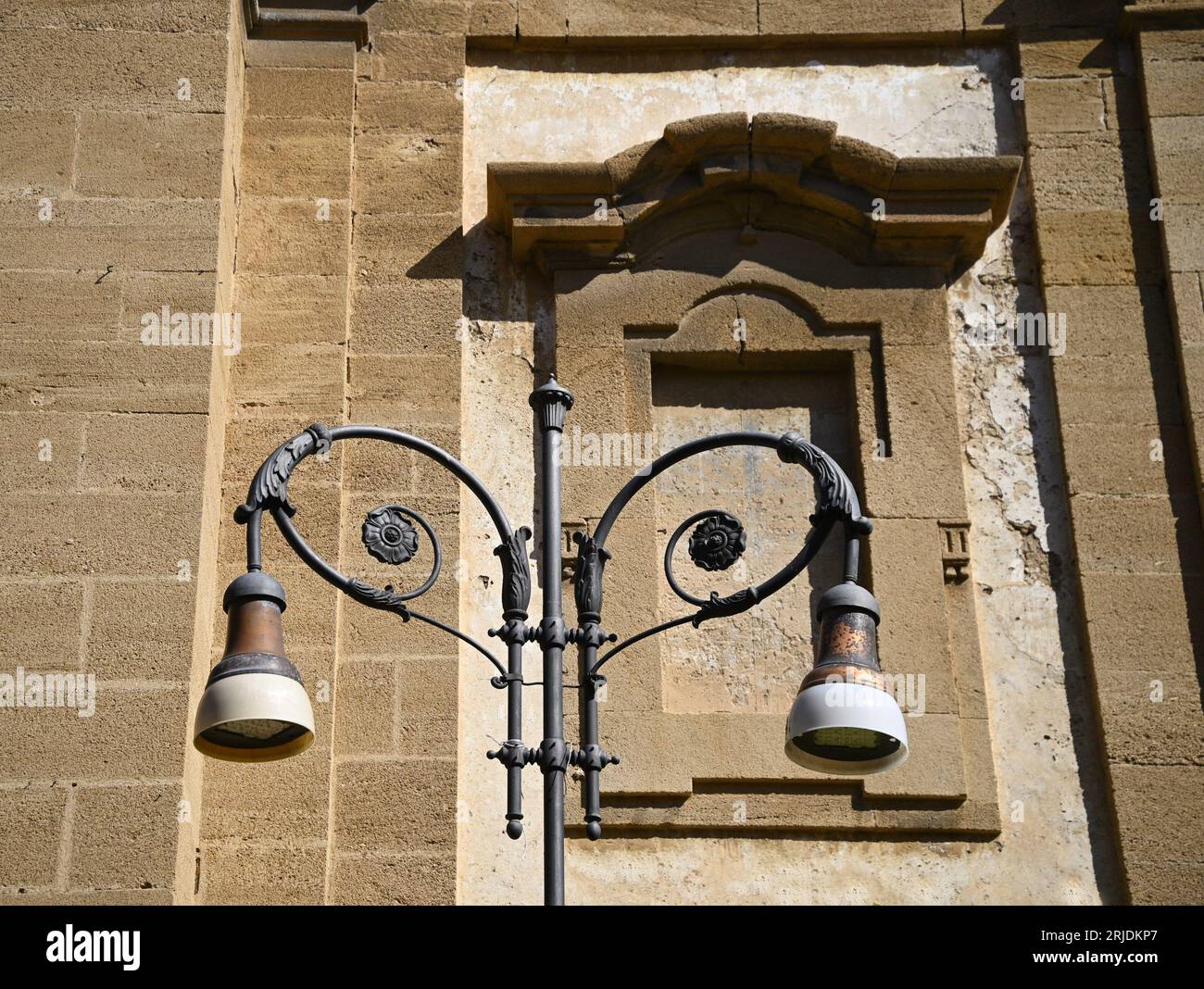 Antique bronze and porcelain lantern on the exterior of the Sicilian Baroque style Chiesa del ...