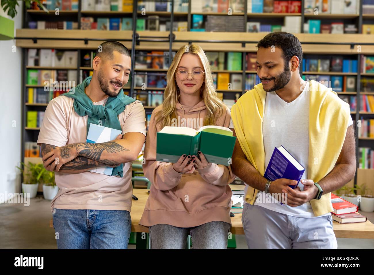 Group of people reading books in library Stock Photo - Alamy