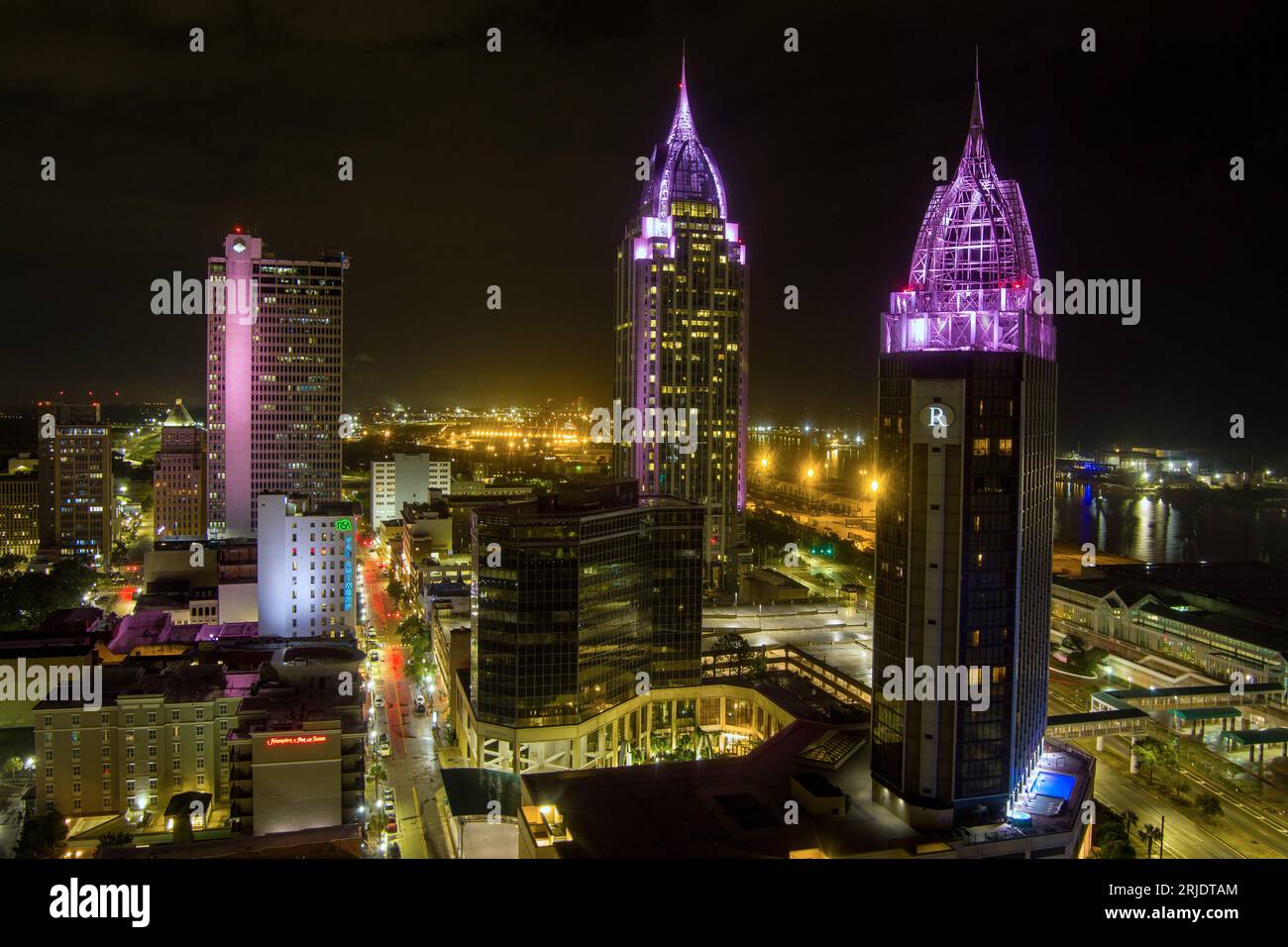 Aerial view of the illuminated downtown Mobile, Alabama waterfront ...