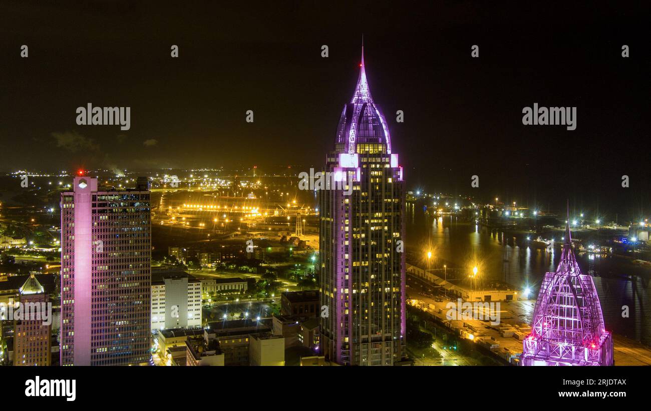 Aerial view of the illuminated downtown Mobile, Alabama waterfront ...