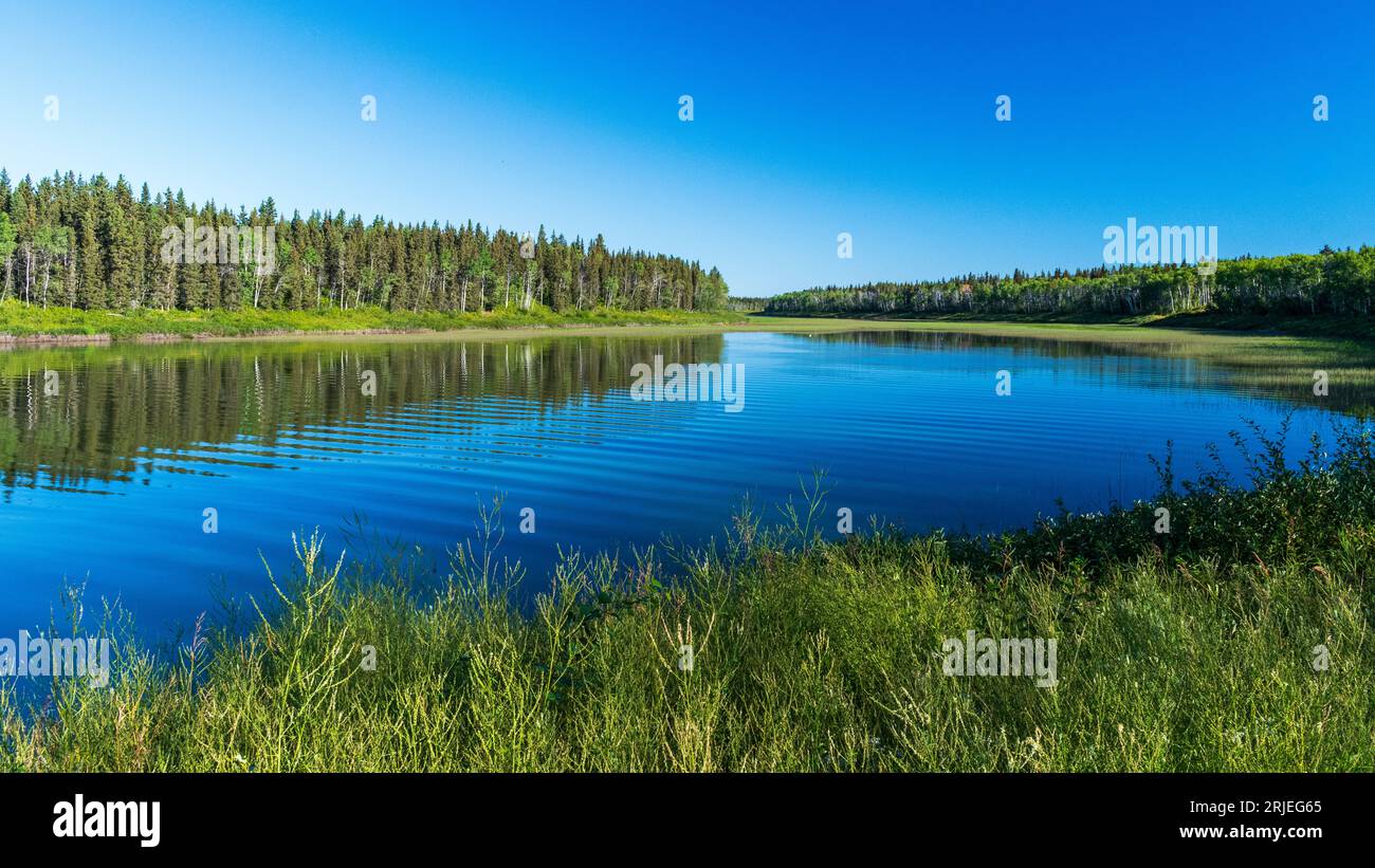 Mackenzie River flows near Fort Providence, Northwest Territories, NT ...