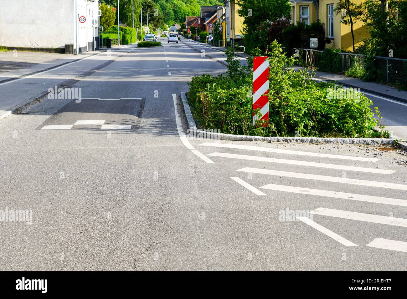 Greenery on the edge of street for forced speed reduction in the city ...