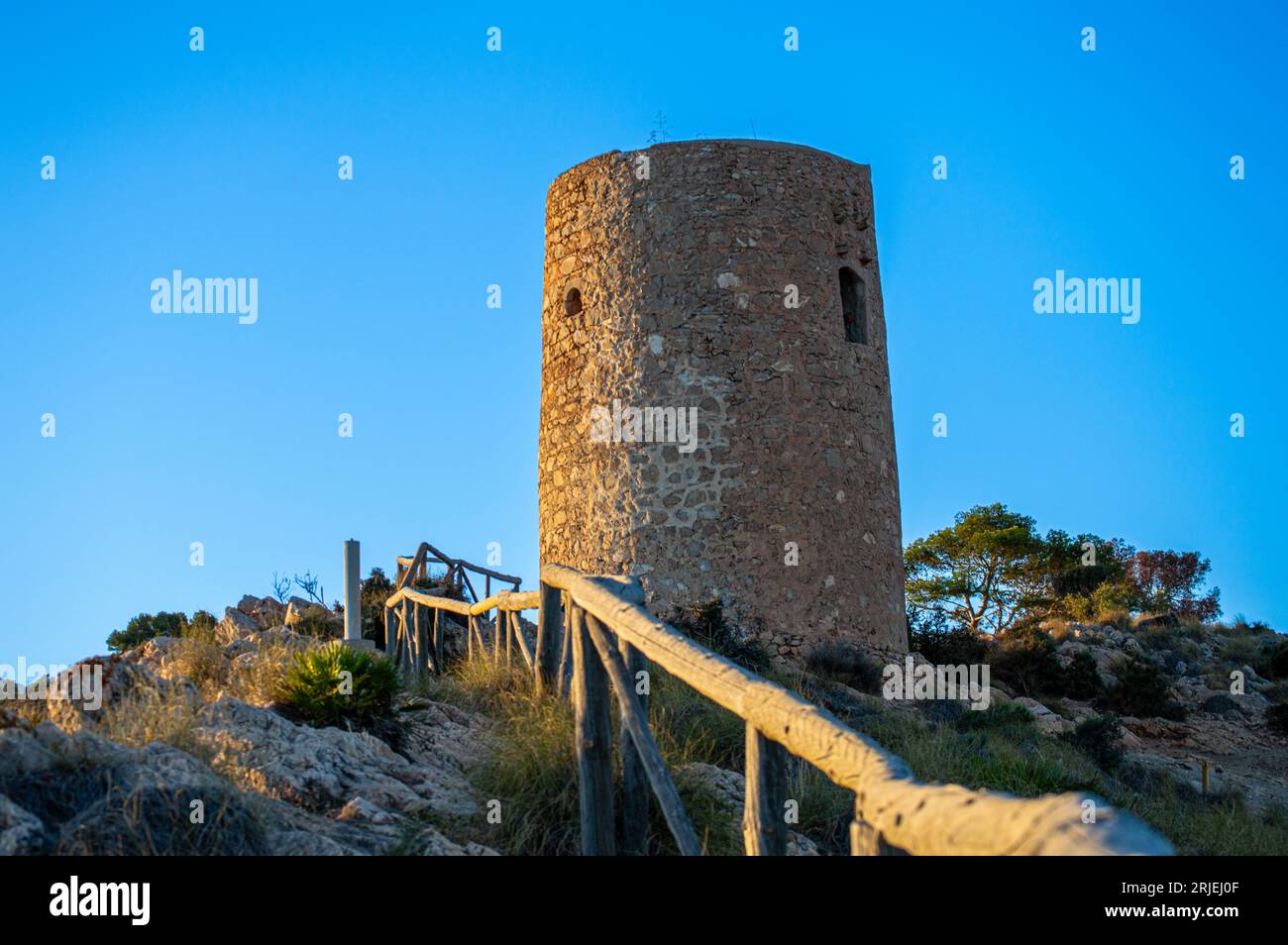 Mediterranean coastal landscape. Historic Torre Vigia De Cerro Gordo, a ...