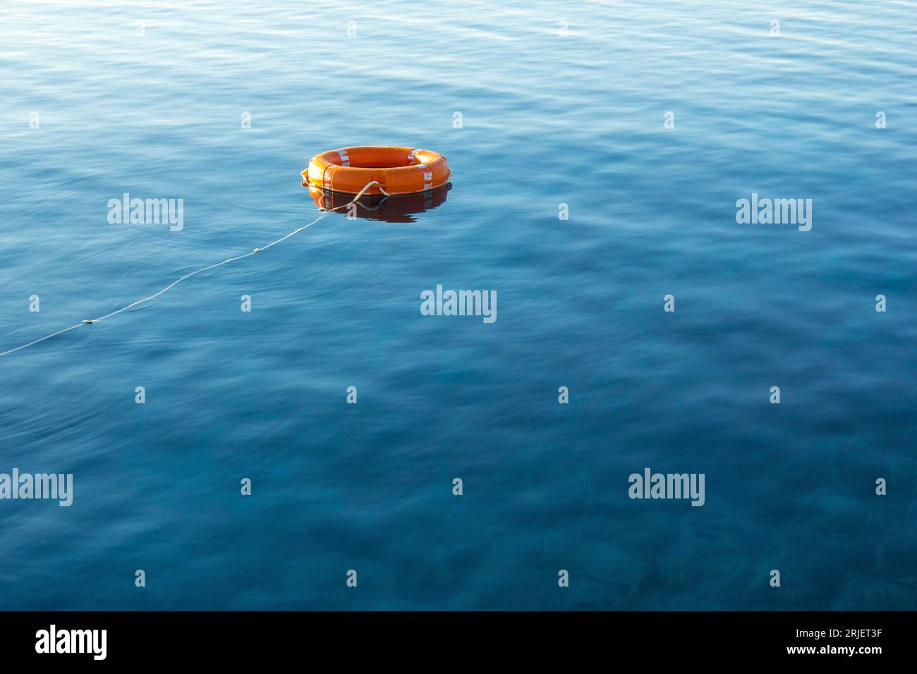 A life saver or life ring floating in the Red Sea off the Coast of ...