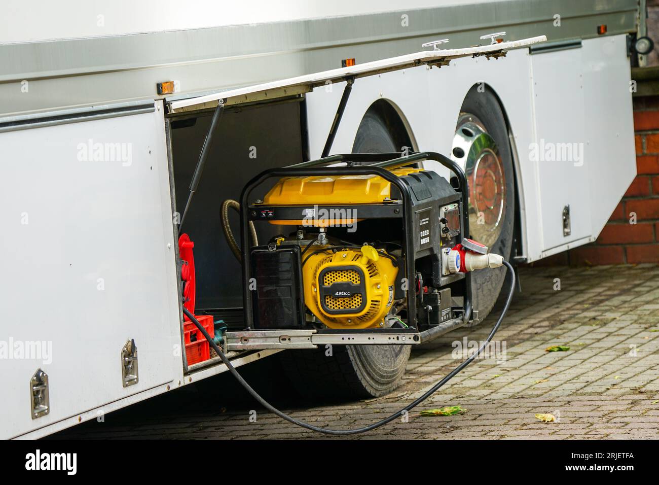 The power generator on the tracks pulled out of the luggage compartment ...
