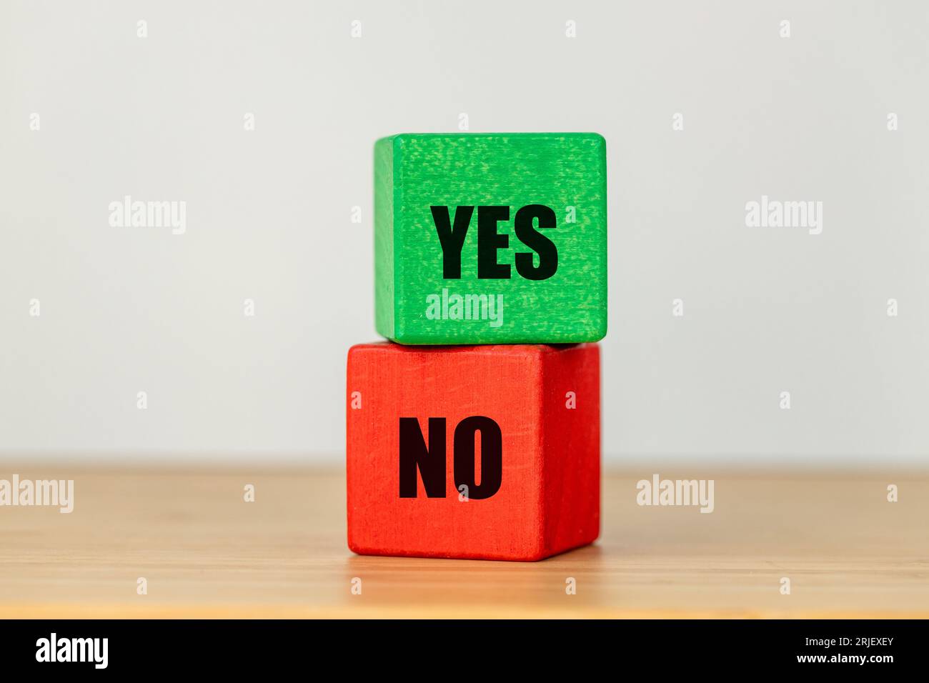 red and green block with yes and no lettering, concept, decision making ...