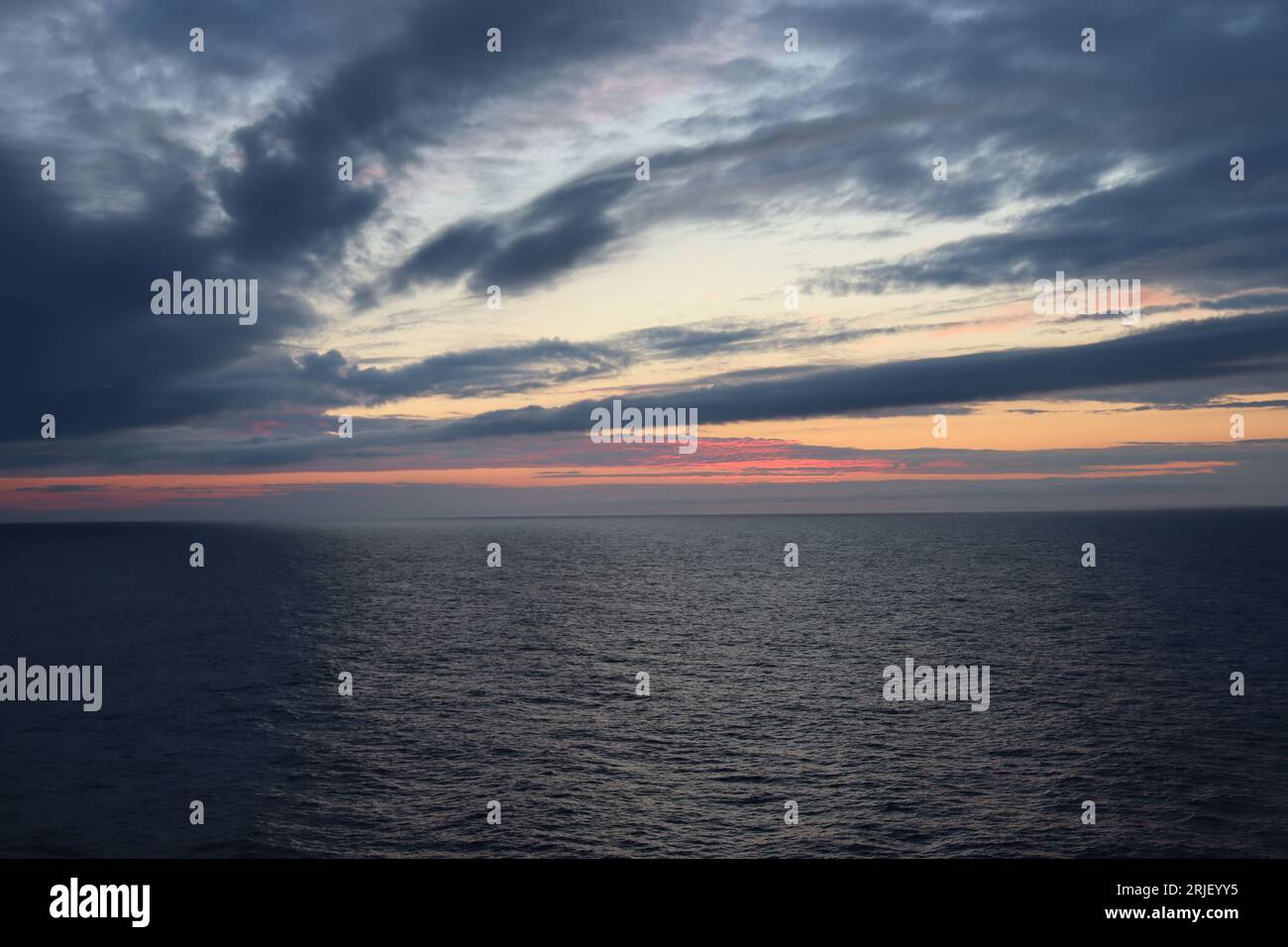 View of sunset over the vast sea Stock Photo - Alamy