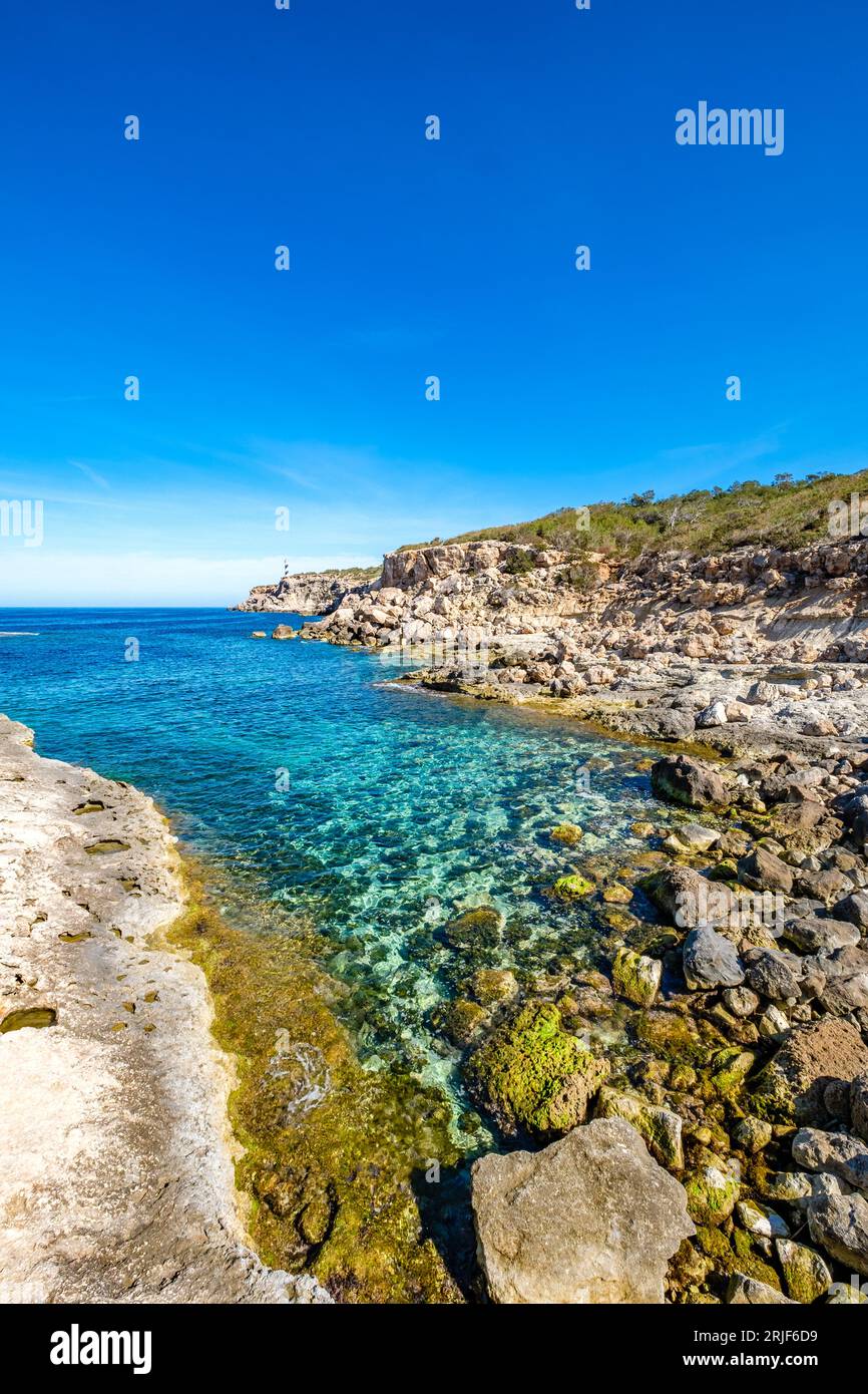 Cala Portinax bay with beautiful azure blue sea water Stock Photo - Alamy