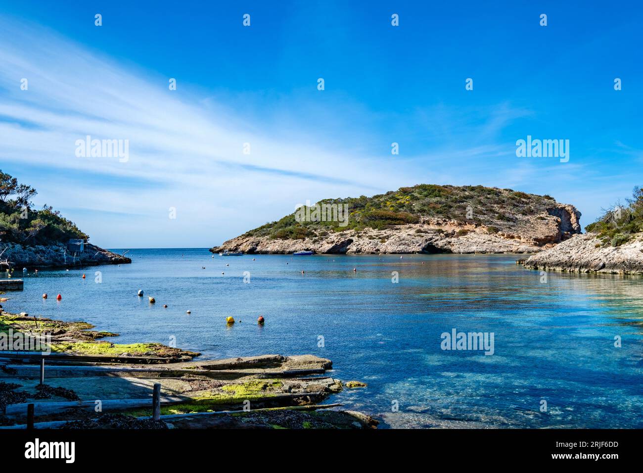 Cala Portinax bay with beautiful azure blue sea water Stock Photo - Alamy