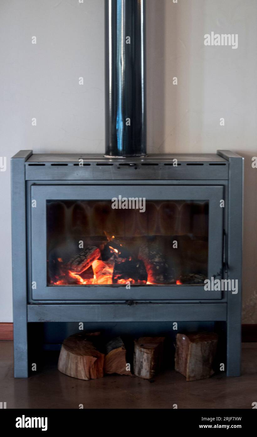 Flames firewood burning inside stove hi-res stock photography and ...