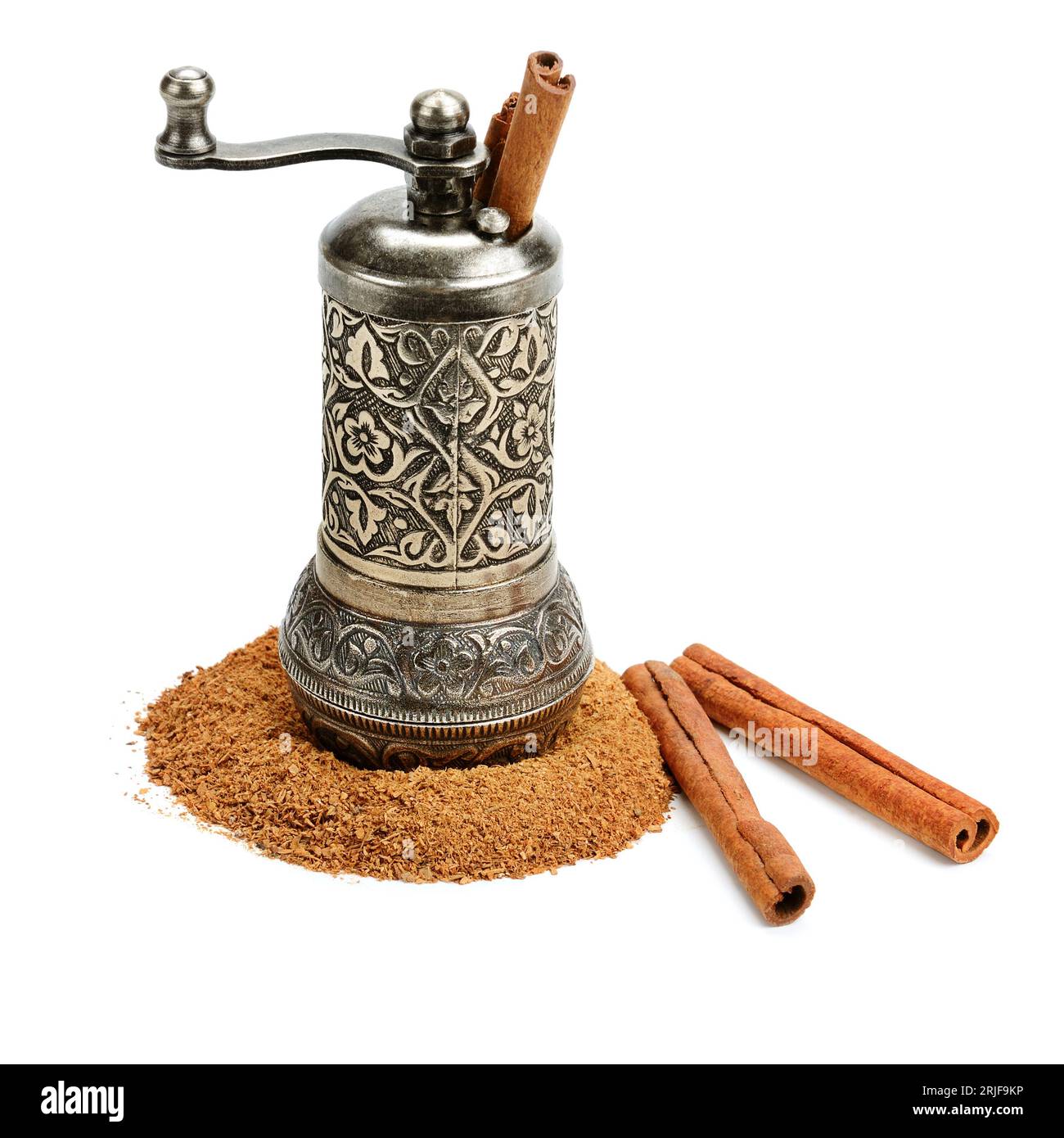 Cinnamon and manual grinder isolated on white background Stock Photo ...
