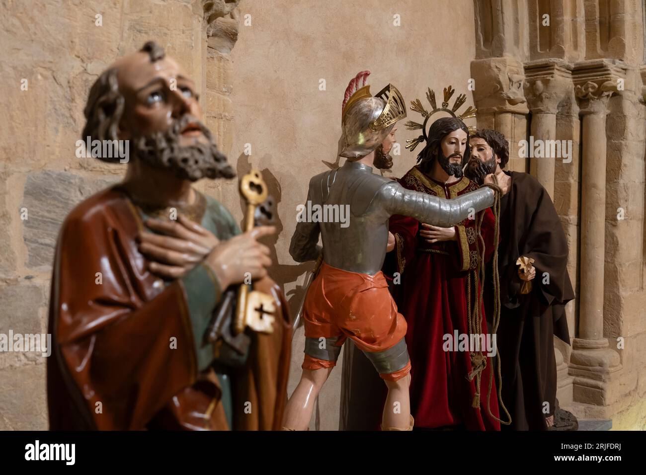 Processional statues representing a Roman soldier preparing Jesus Christ for crucifixion at the ...