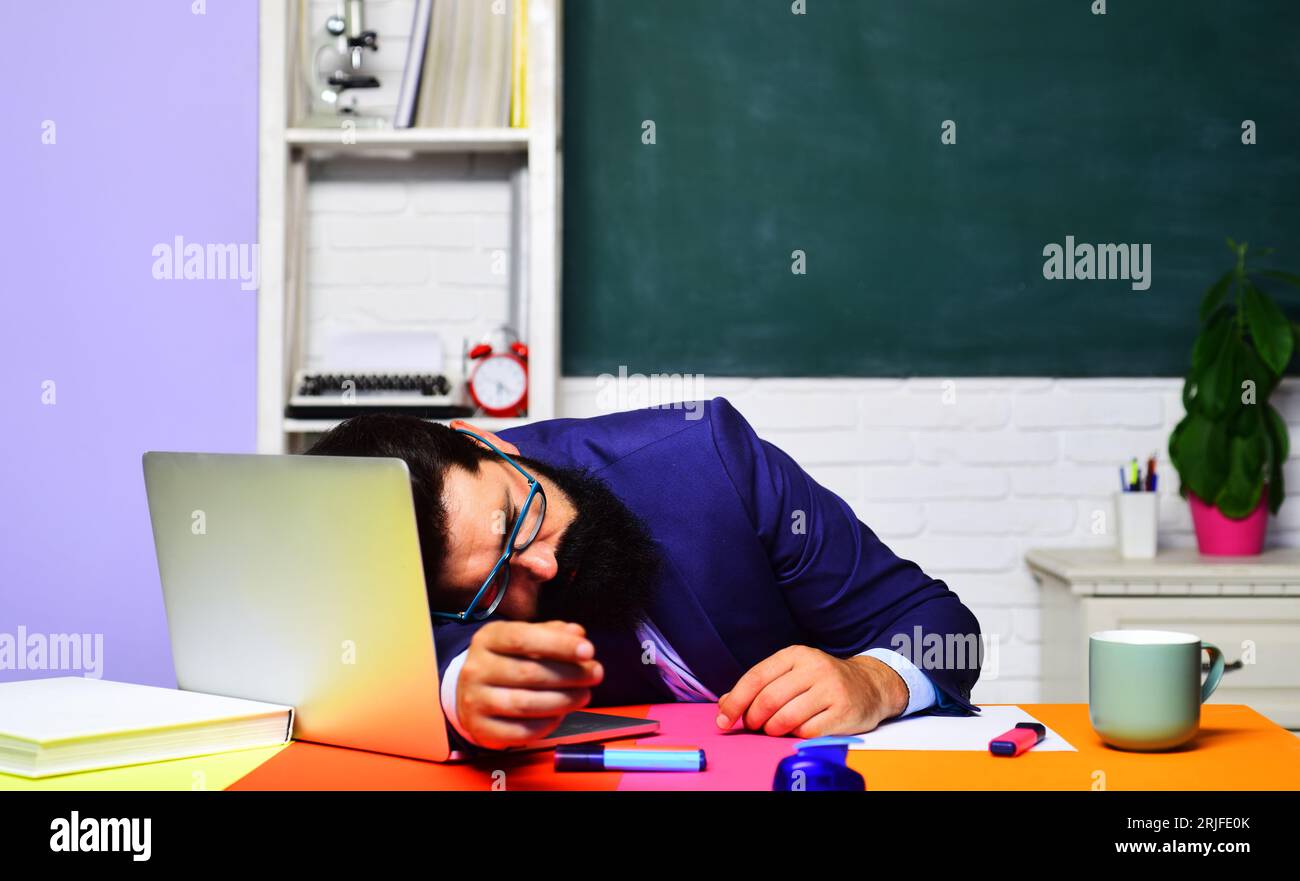 Back to school. School job. Teachers day. Tired male teacher in glasses ...