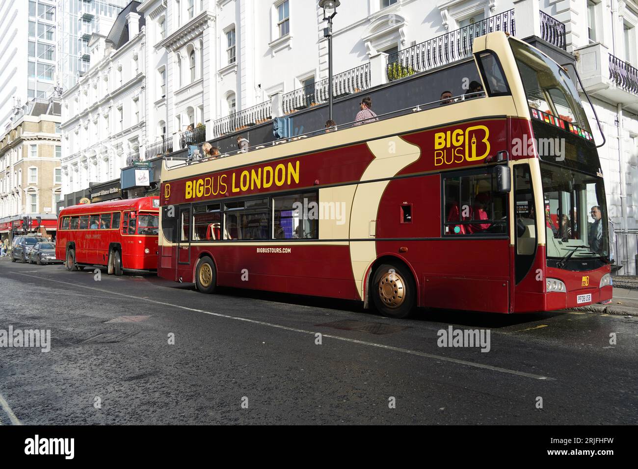 London, UK - October 2022: Tourists touring the city of London on a ...