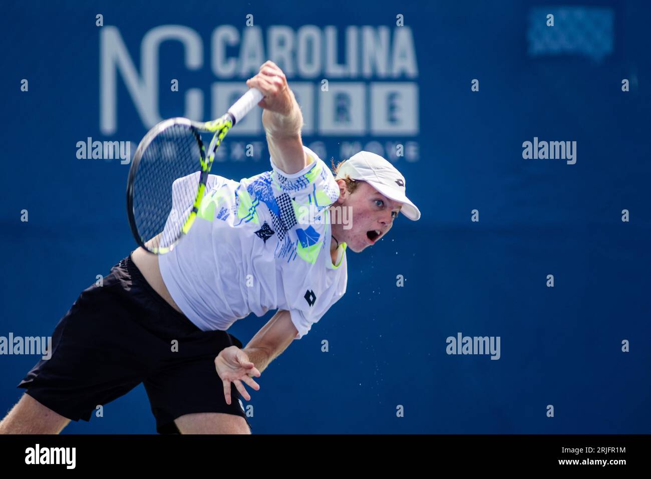 August 22, 2023: Alex Michelsen follows through the serve during the ...