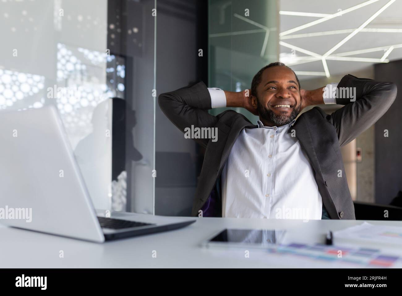 Well done businessman successfully completed the work, rests in the ...