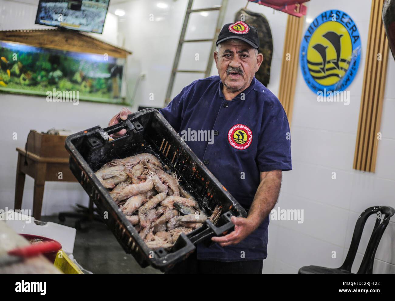 Gaza City, Palestine. 22nd Aug, 2023. A Palestinian fisherman displays ...