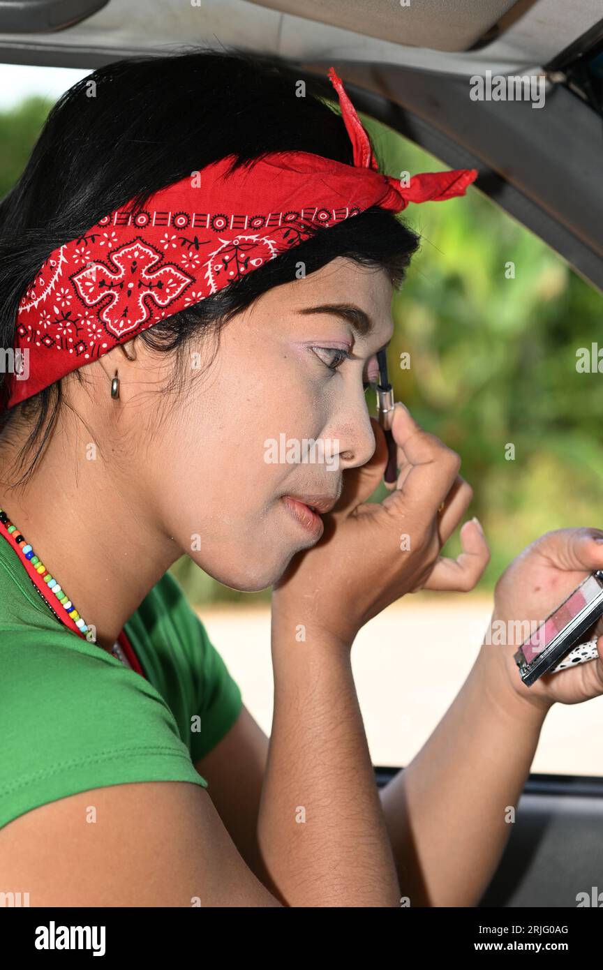 Beautiful Asian woman with dark eyebrows hold eyebrow brush. Eyebrows ...