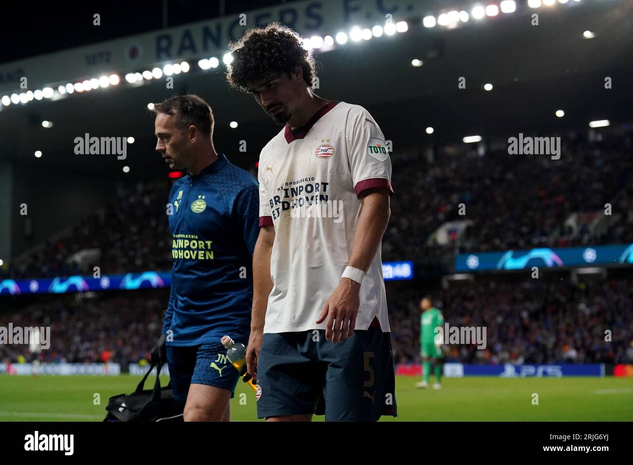 PSV Eindhoven’s Andre Ramalho Silva is taken off after an injury during ...
