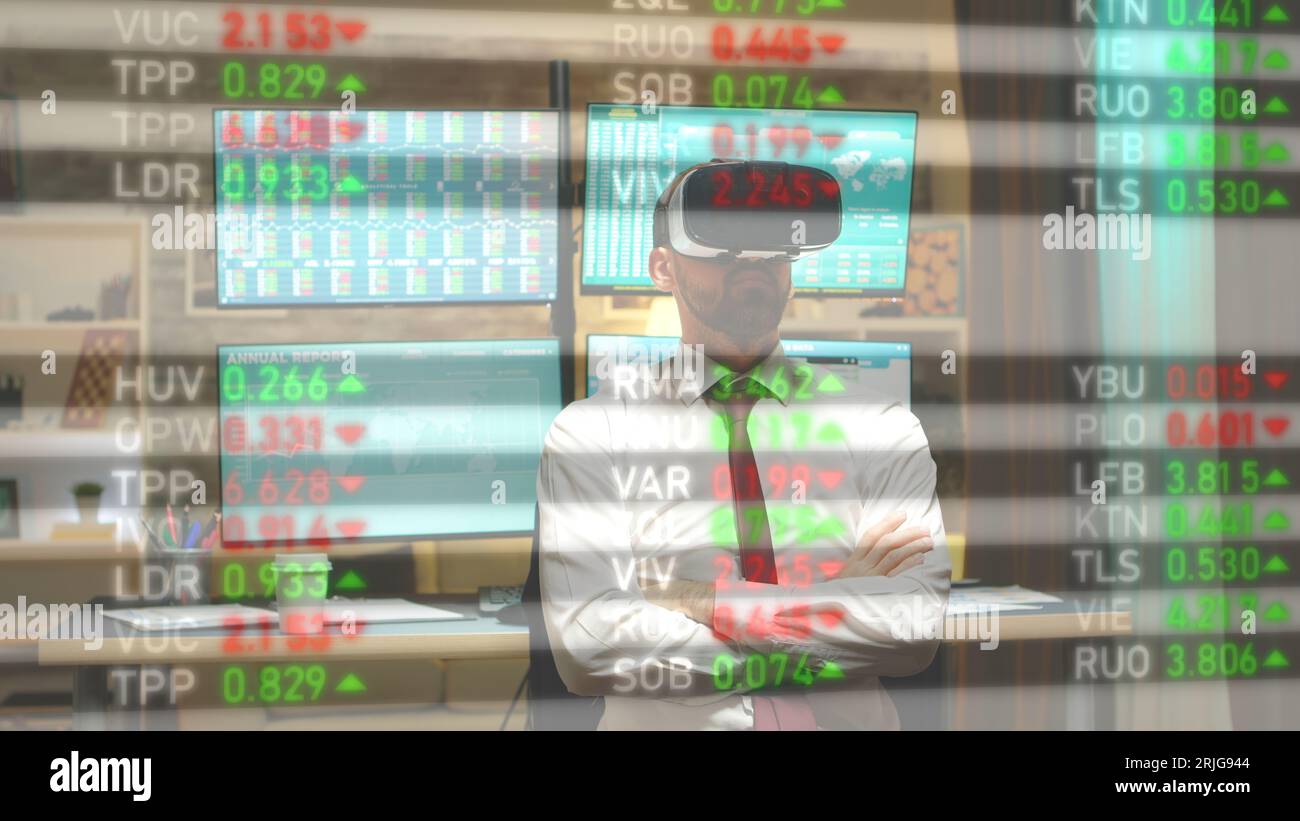 Businessman analyzes financial data on a display screen using virtual ...