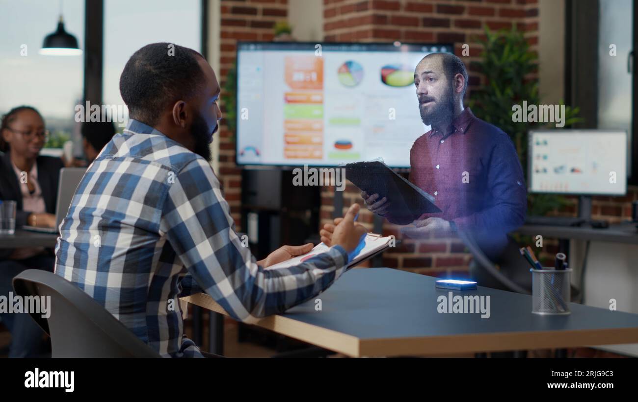 Businessman watching augmented reality training video visualization of ...