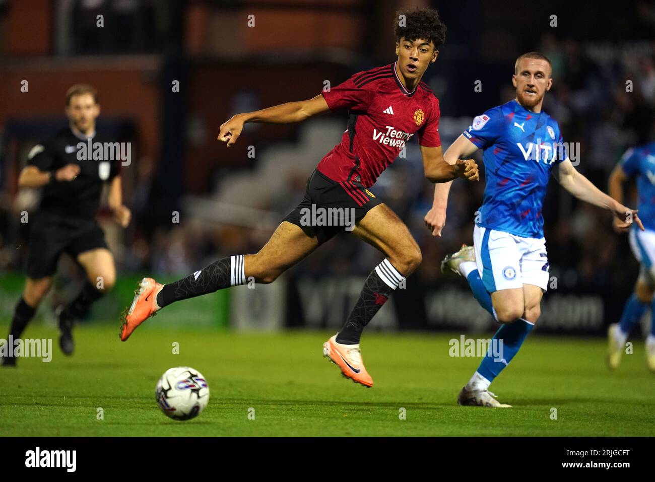 Manchester United's Ethan Wheatley and Stockport County's Connor Evans ...