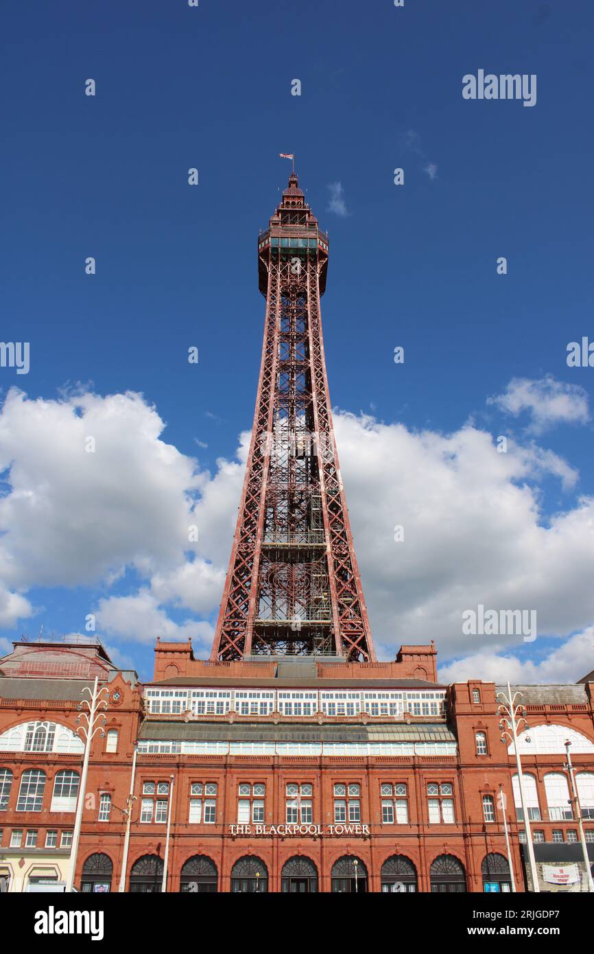 Blackpool Tower with blue skies and white clouds Stock Photo - Alamy
