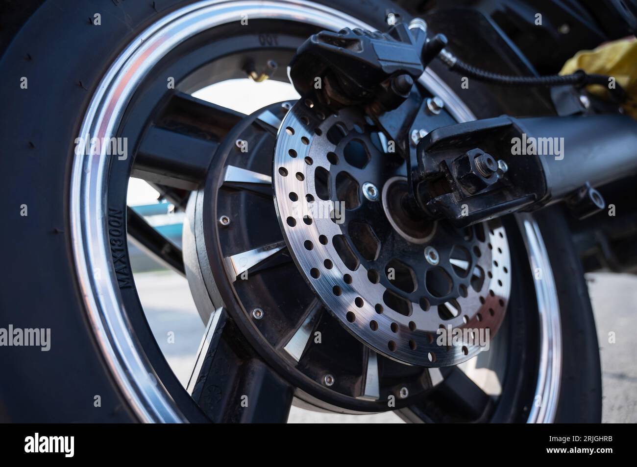 Close-up of a wheel with a motor of an electric motorcycle Stock Photo ...