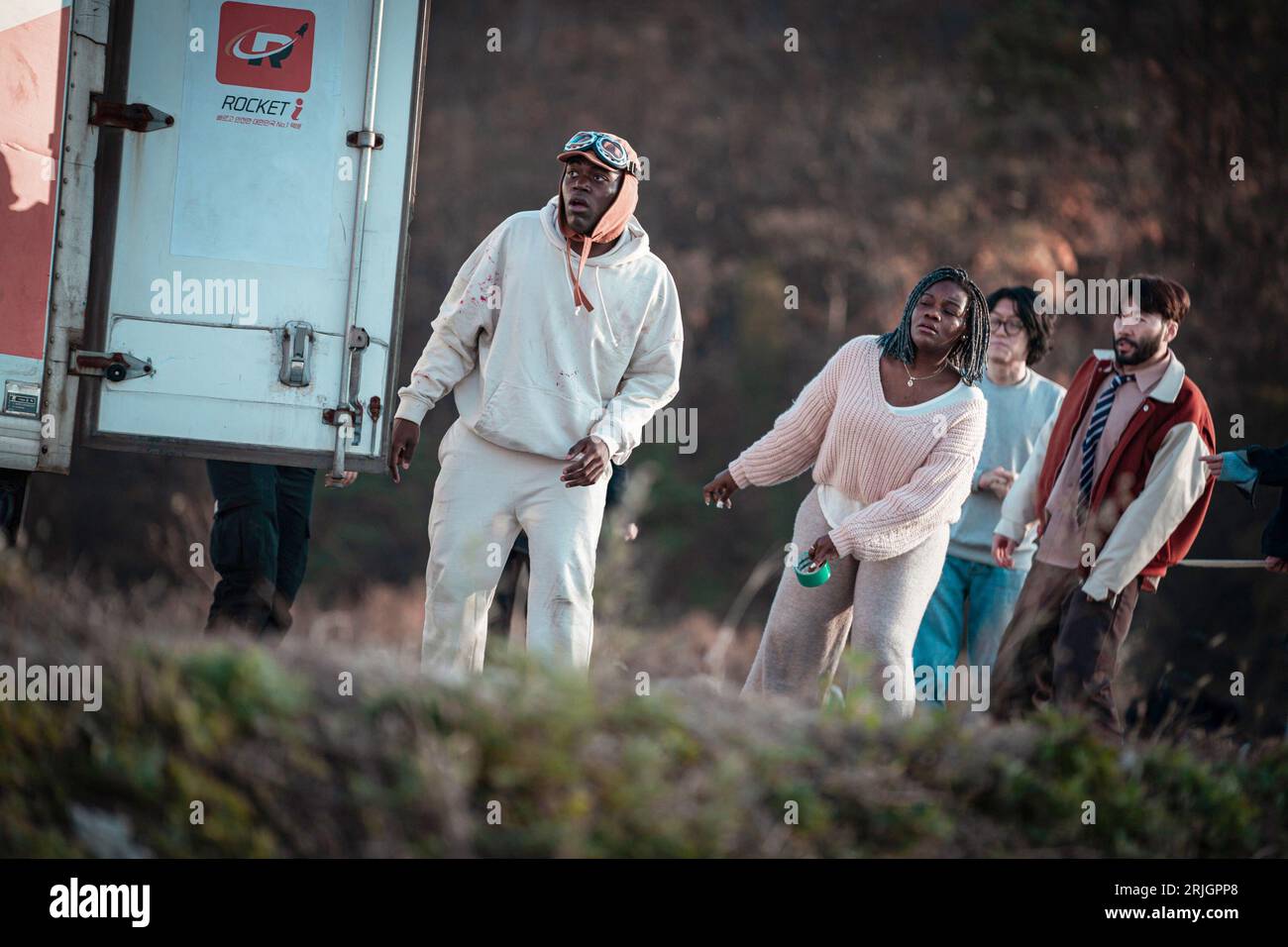 ZOMBIEVERSE, from left: Jonathan Yiombi, Patricia Yiombi, HONG Seong ...