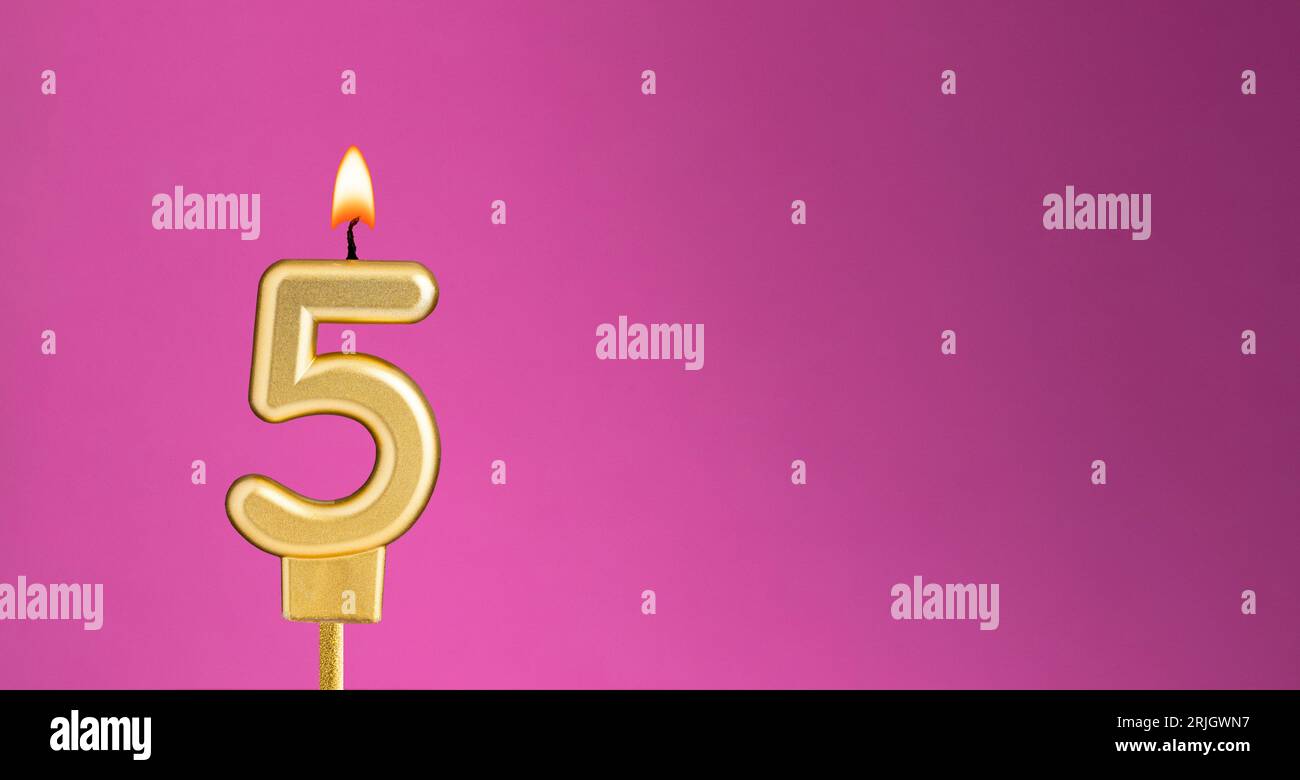 Candle number 5 in purple background - birthday card Stock Photo - Alamy