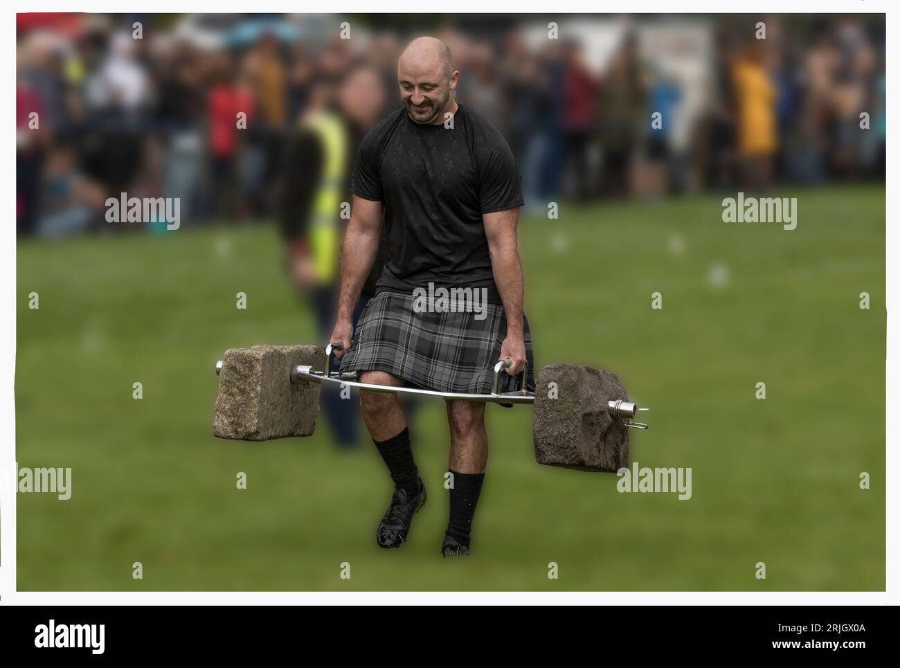 Stirling, Scotland, UK - August 19th 2023 - Strongman wearing a kilt ...