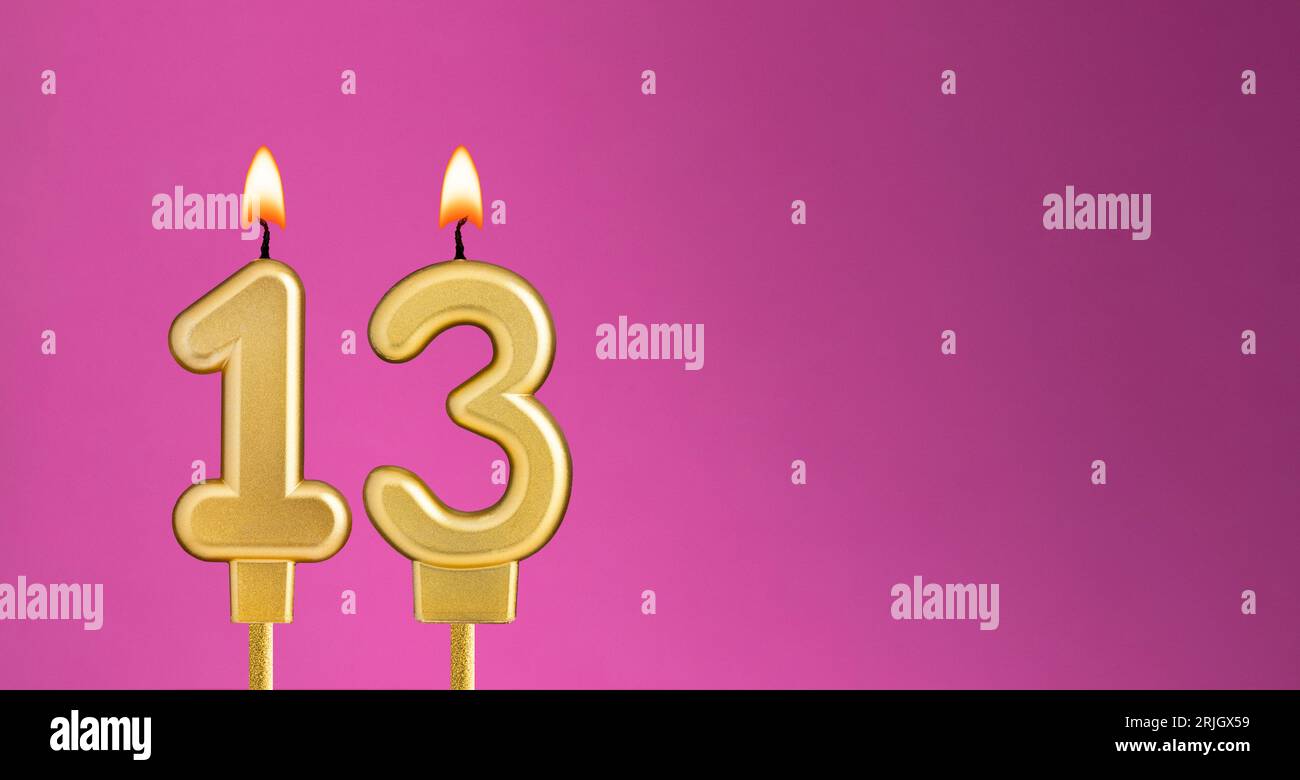 Candle number 13 in purple background - birthday card Stock Photo - Alamy