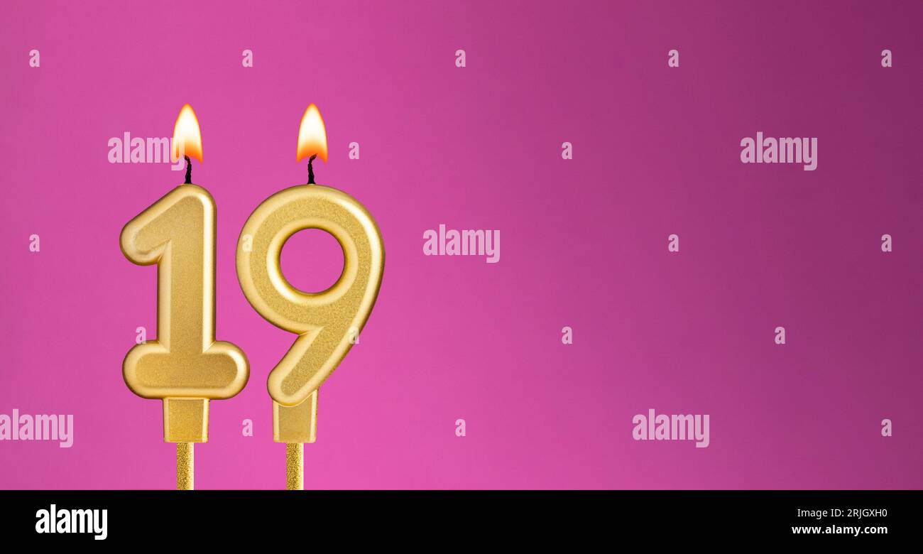 Candle number 19 in purple background - birthday card Stock Photo - Alamy