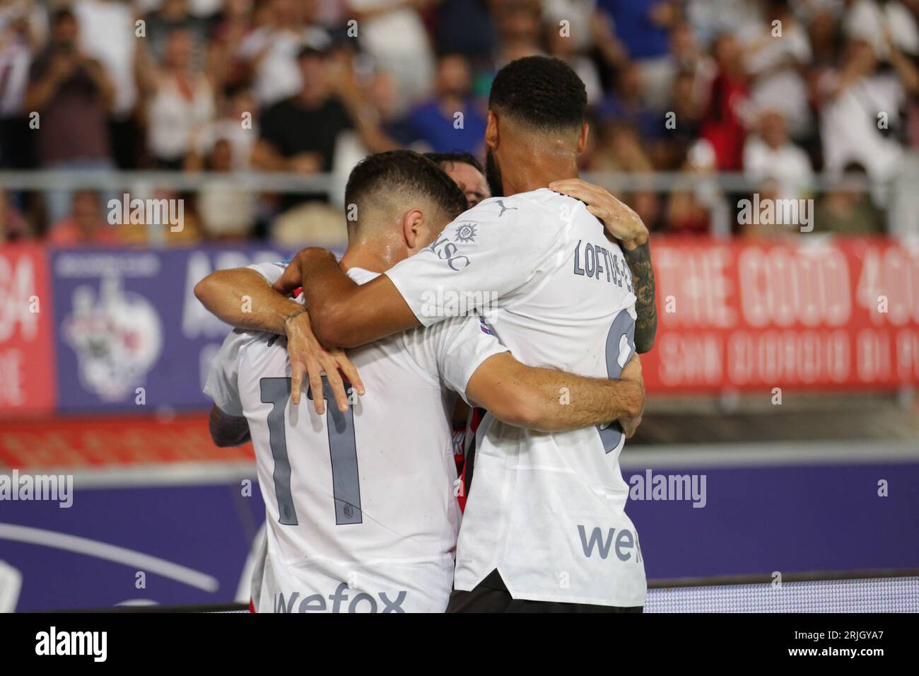 Bologna, Italy. 21st Aug, 2023. Christian Pulisic of AC Milan (L) and ...