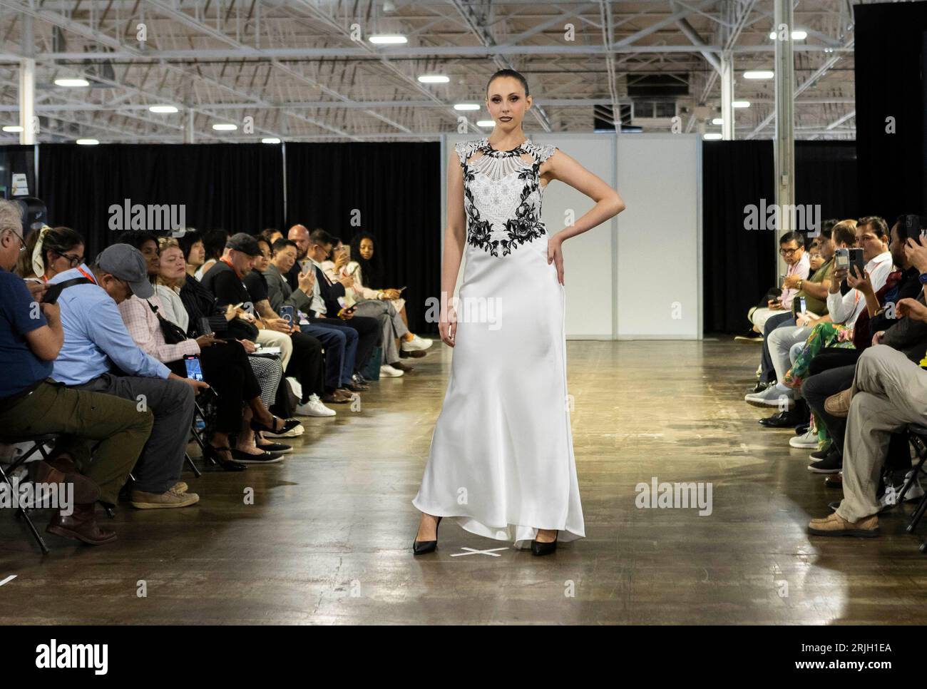 Toronto, Canada. 22nd Aug, 2023. A model presents a creation during a ...
