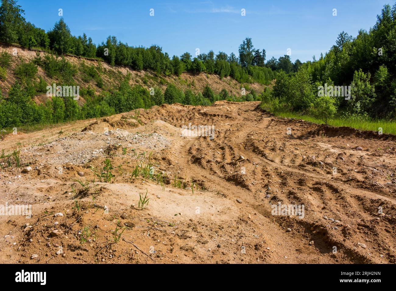 Sand and rocky landscape in an old abandoned sand pit Stock Photo - Alamy