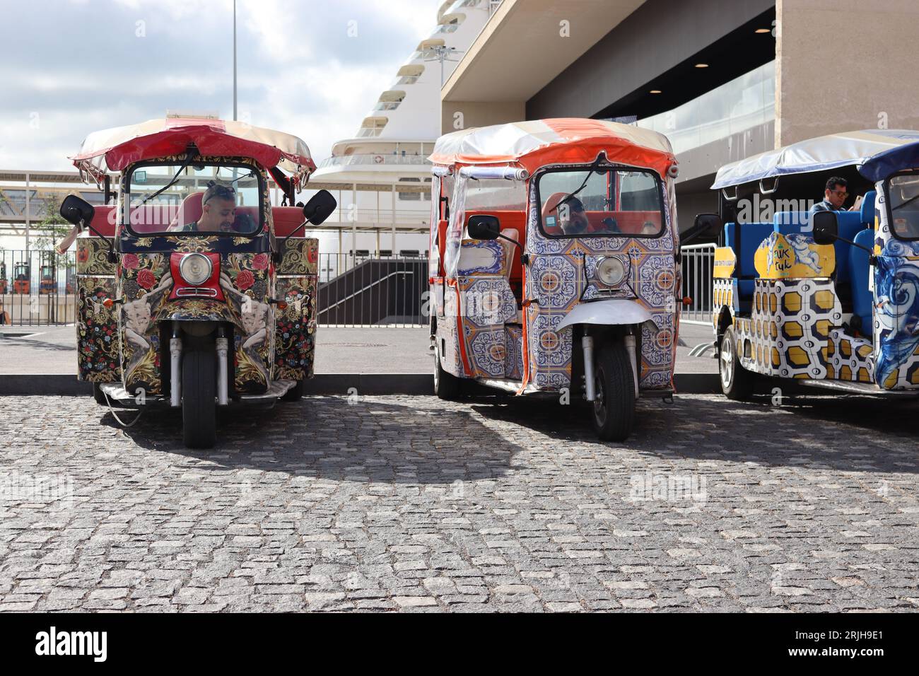 Tuck-tuck drivers awaiting customers at the cruise port terminal taxi ...