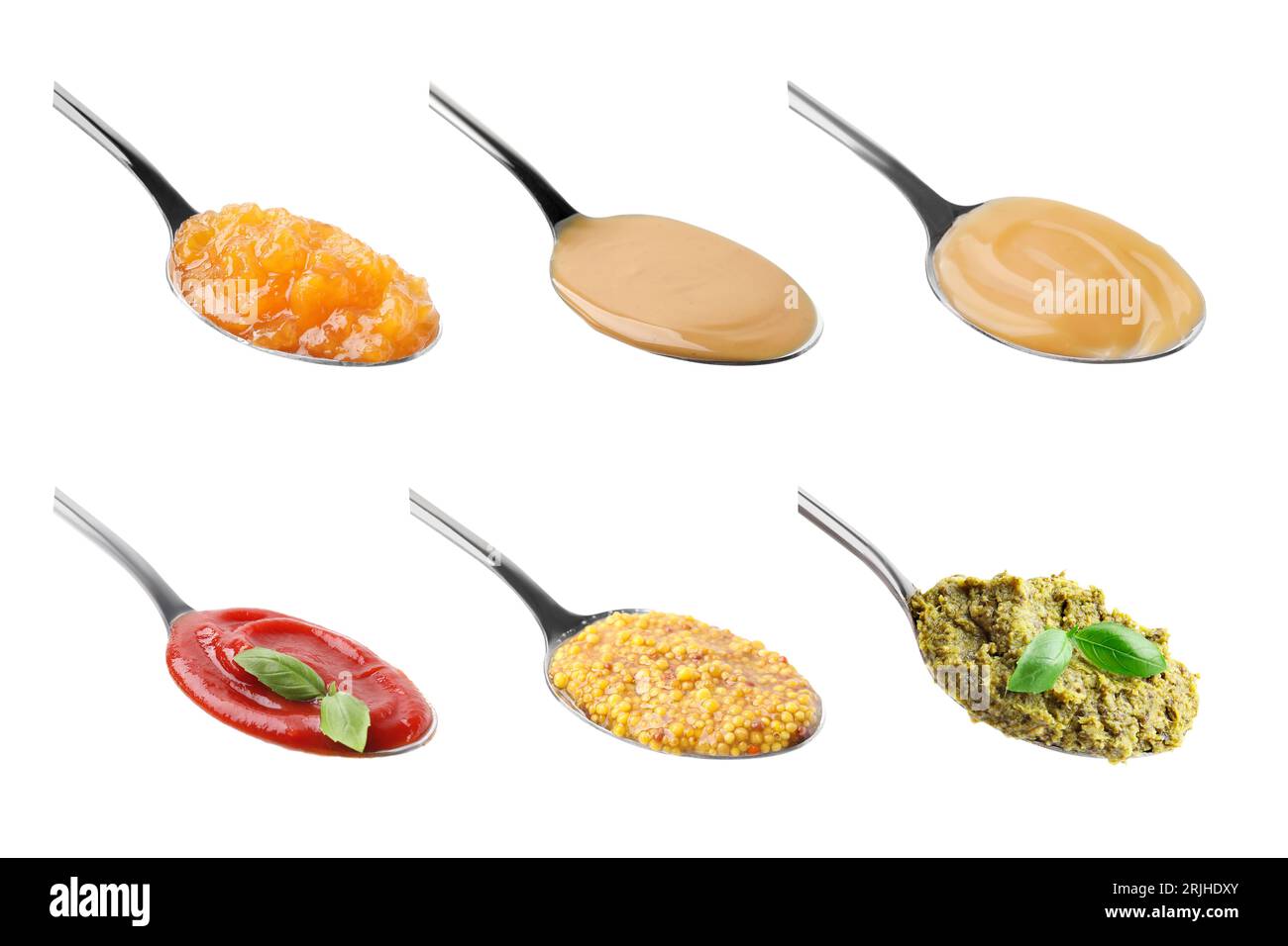 Set of spoons with different food isolated on white Stock Photo - Alamy