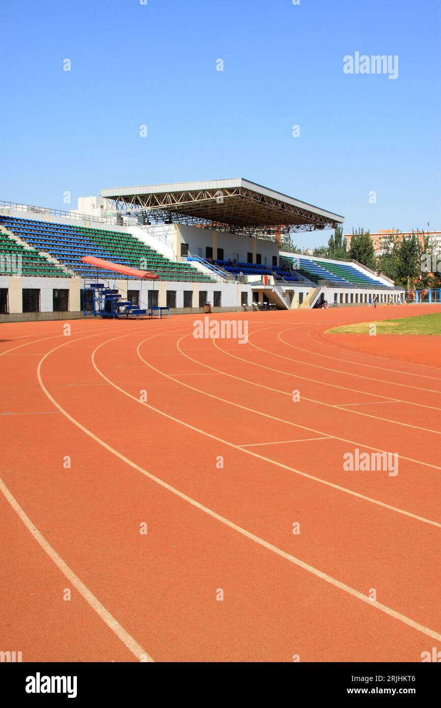 Beijing, October 5, 2012: Red plastic runway stadium and rostrum, at ...