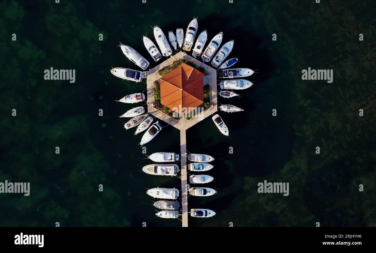 An aerial view of Solaris Boat Marina featuring white boats Stock Photo ...